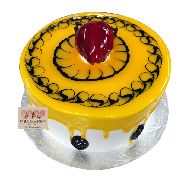 (2125) Round Cake topped in Yellow & Black - ABC Cake Shop & Bakery